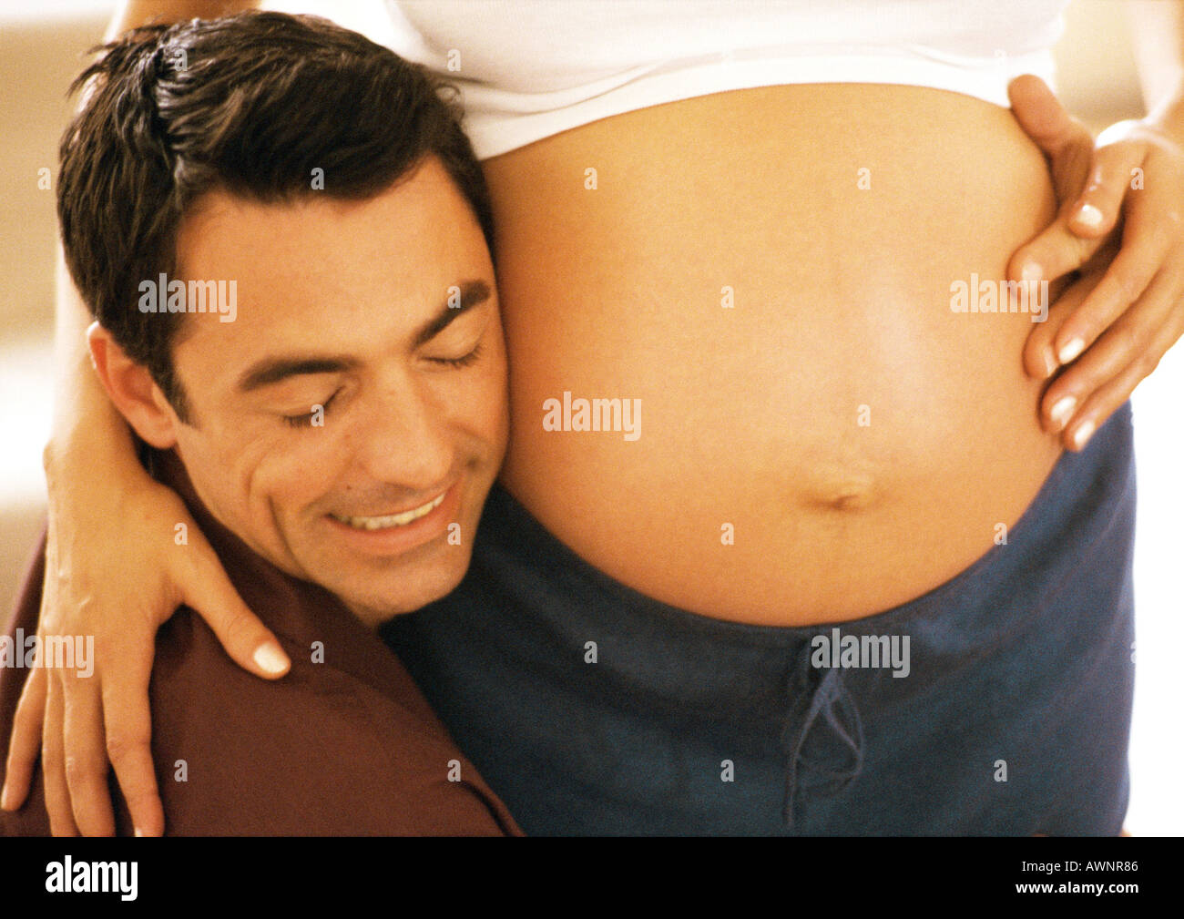 Pregnant belly couples hands hi-res stock photography and images - Alamy