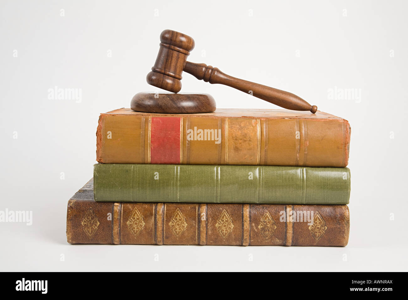 A gavel on top of books Stock Photo - Alamy