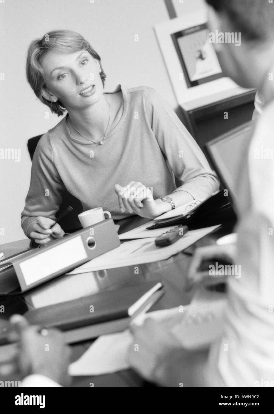 Business man listening working Black and White Stock Photos & Images ...