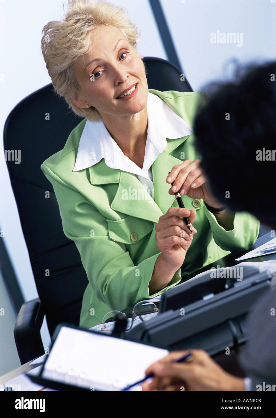 Business people meeting sitting corner hi-res stock photography and ...