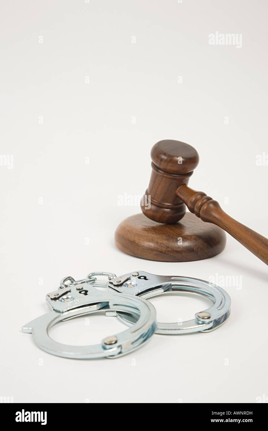 A gavel and handcuffs Stock Photo - Alamy