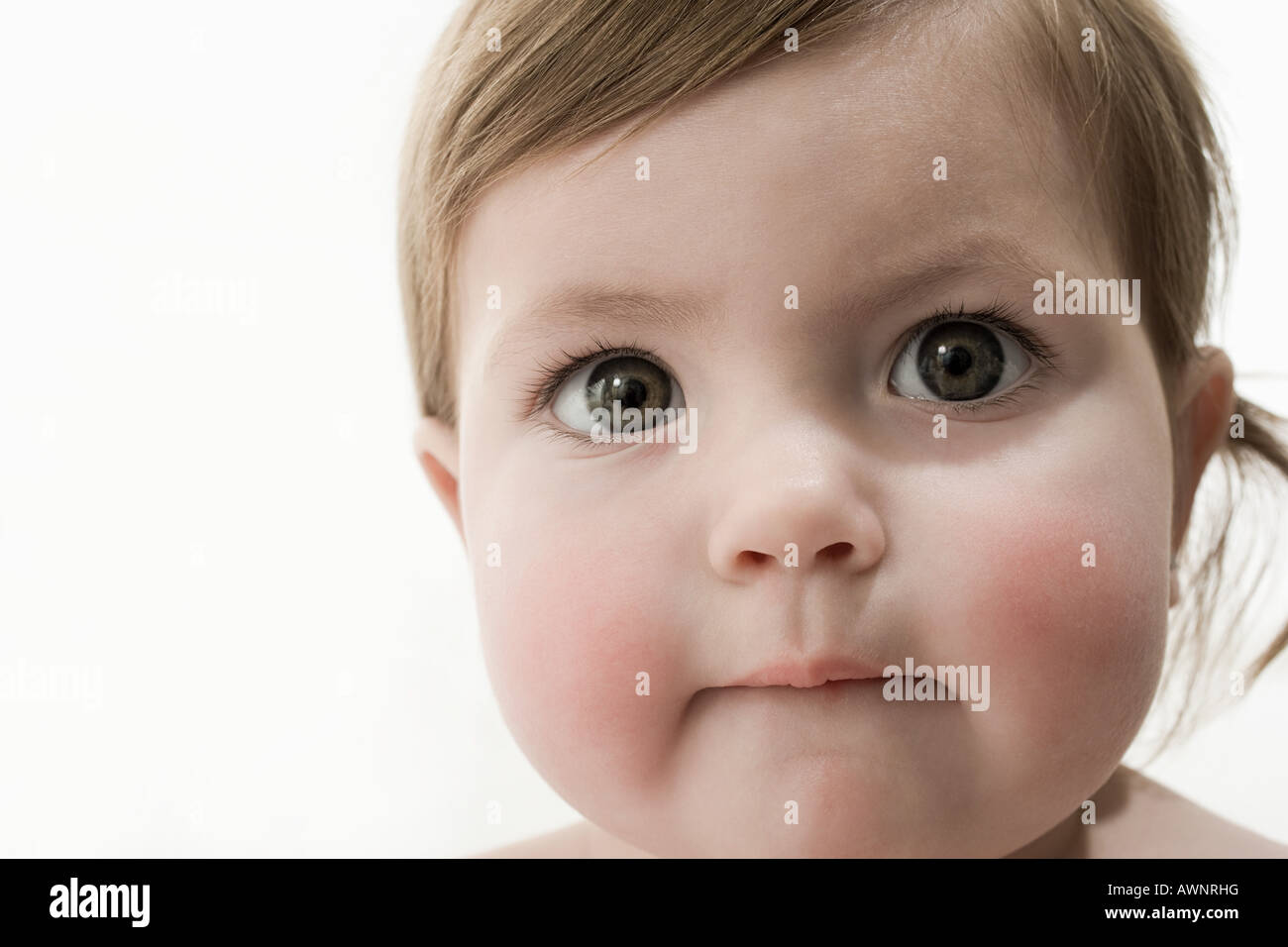 Face of a baby girl Stock Photo - Alamy