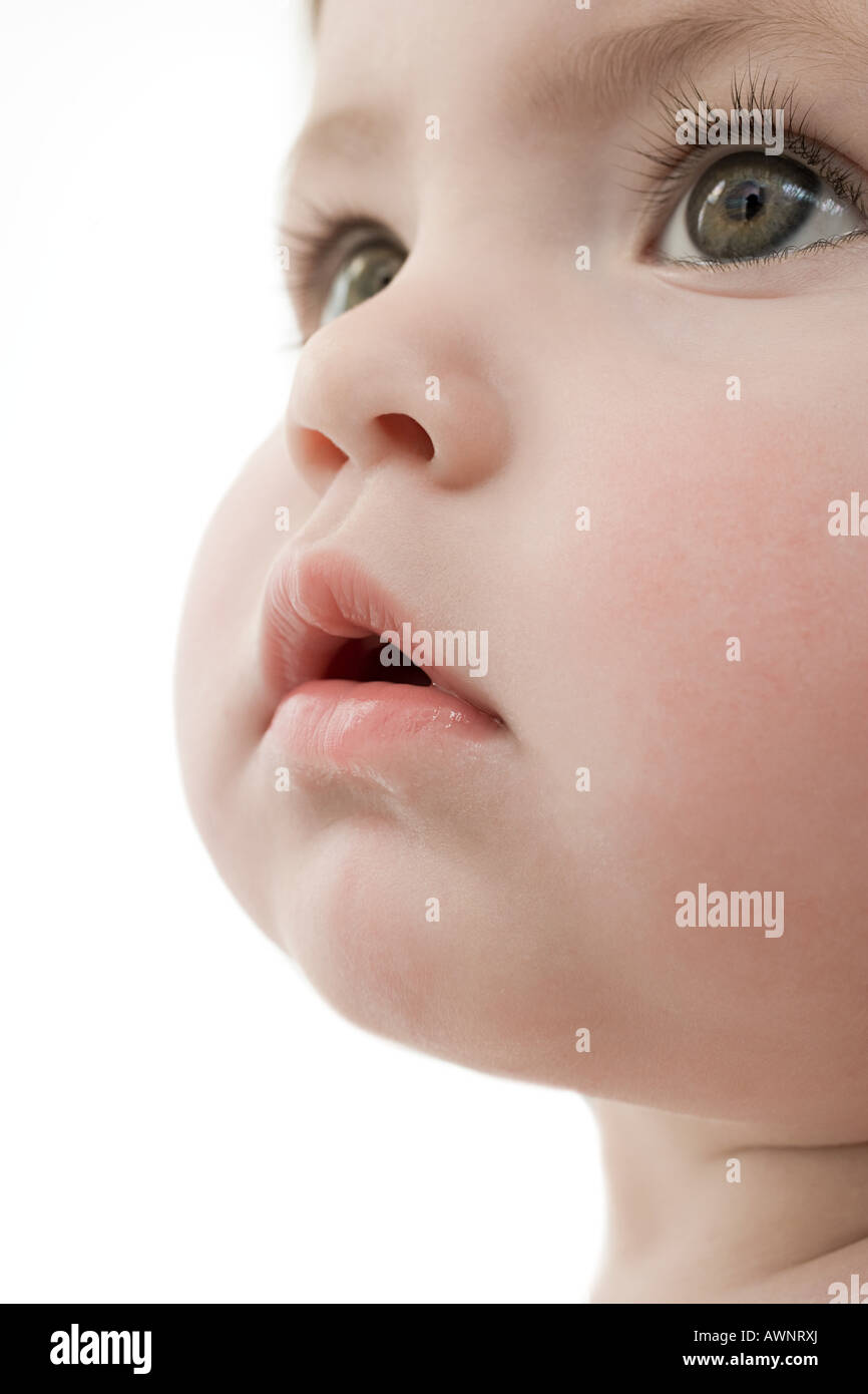 Face of a baby girl Stock Photo - Alamy
