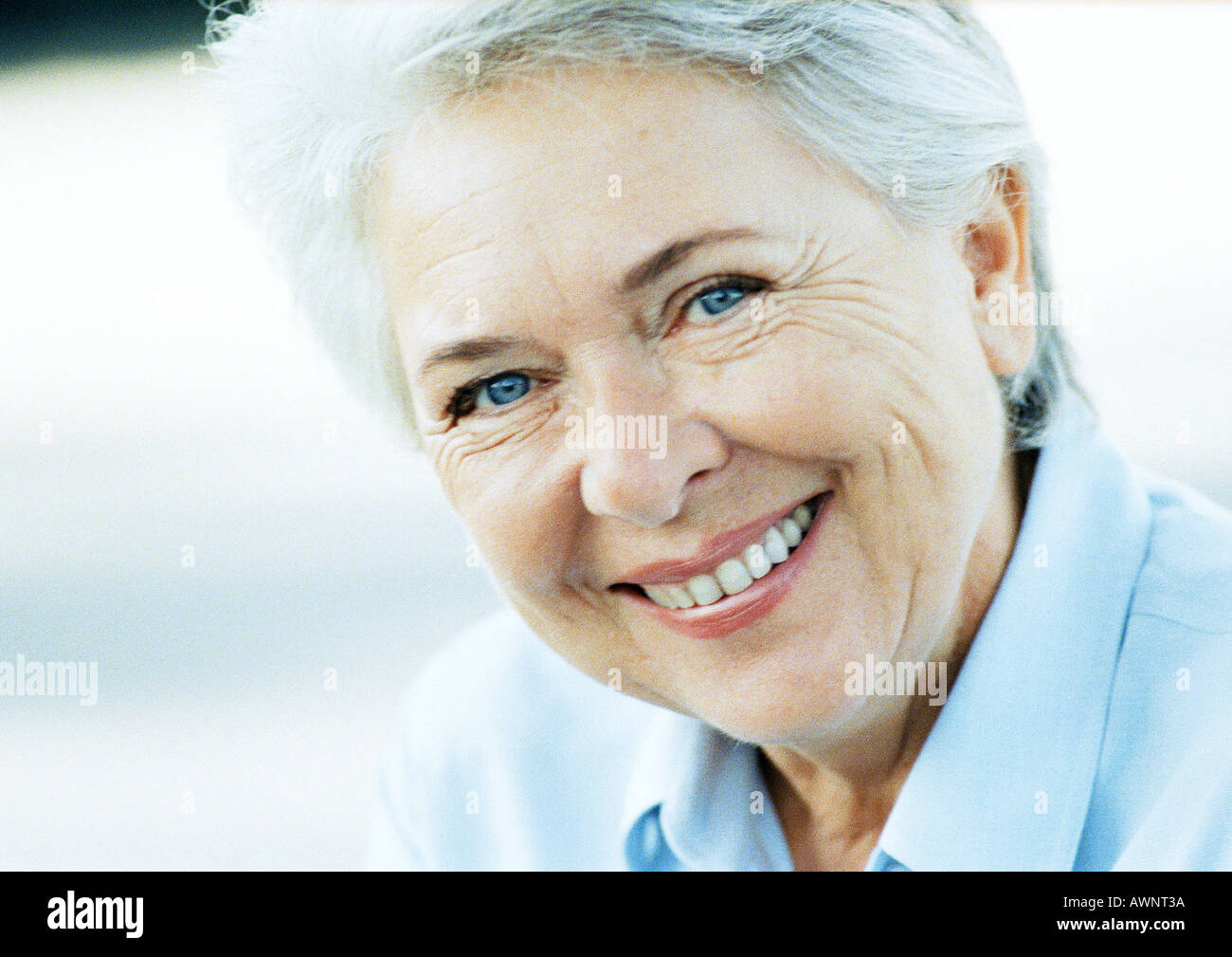 Mature woman smiling, close-up, portrait Stock Photo - Alamy