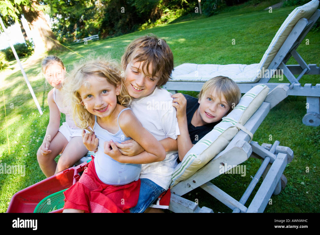 Children playing in the backyard Stock Photo - Alamy