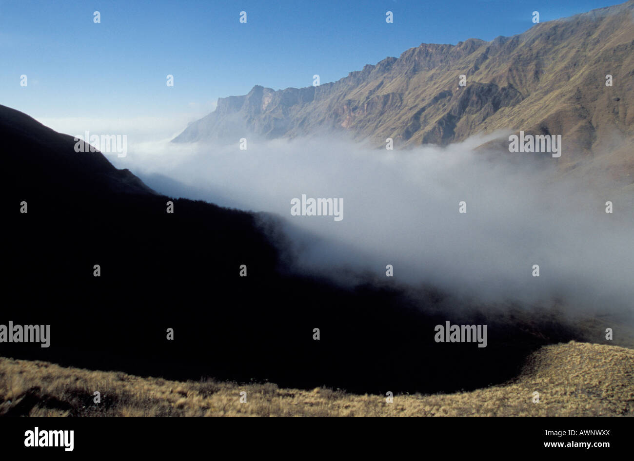 Fog coming in into a desert valley of the Atacama desert Argentina near ...