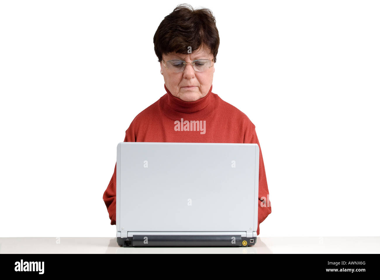 Senior woman in front of a computer Studio picture Full isolated Stock ...