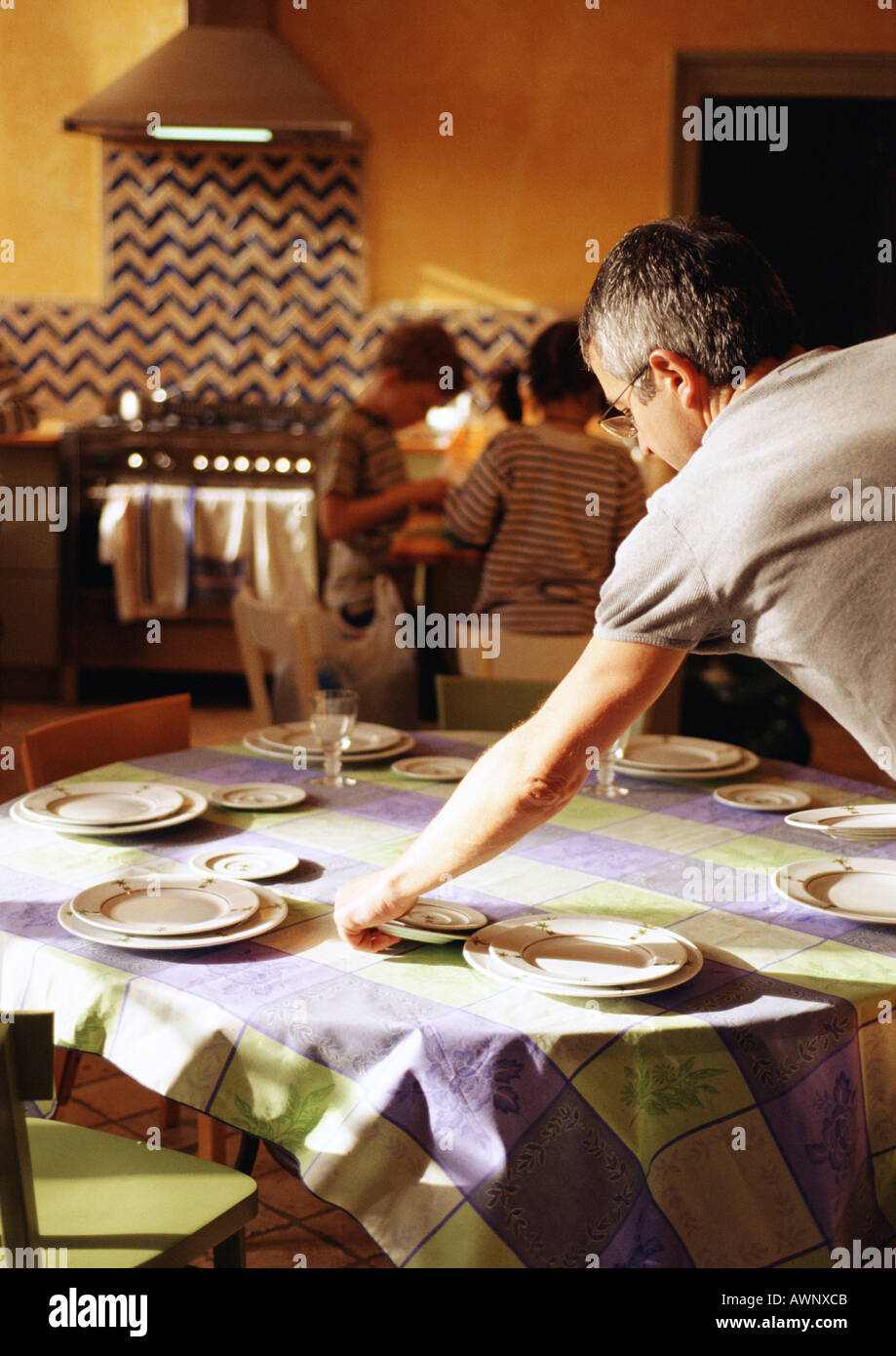 Setting table man son hi-res stock photography and images - Alamy