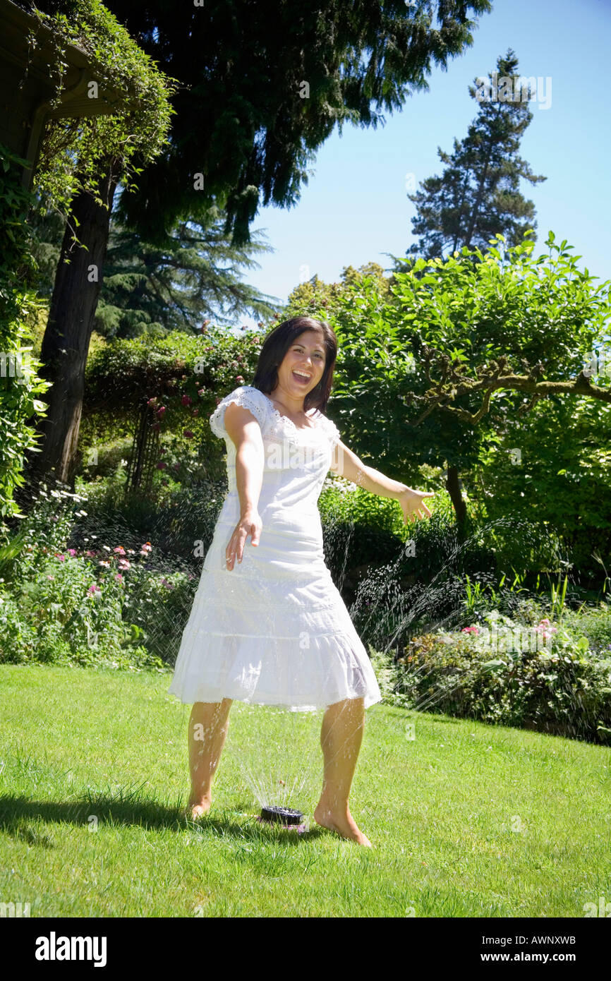 Woman dancing laughing in grass hi-res stock photography and images - Alamy