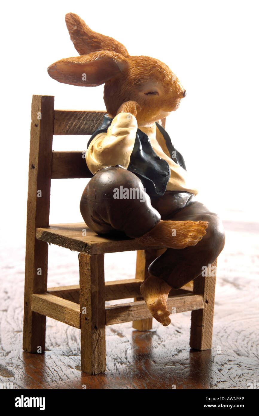Easter bunny on a chair Stock Photo - Alamy