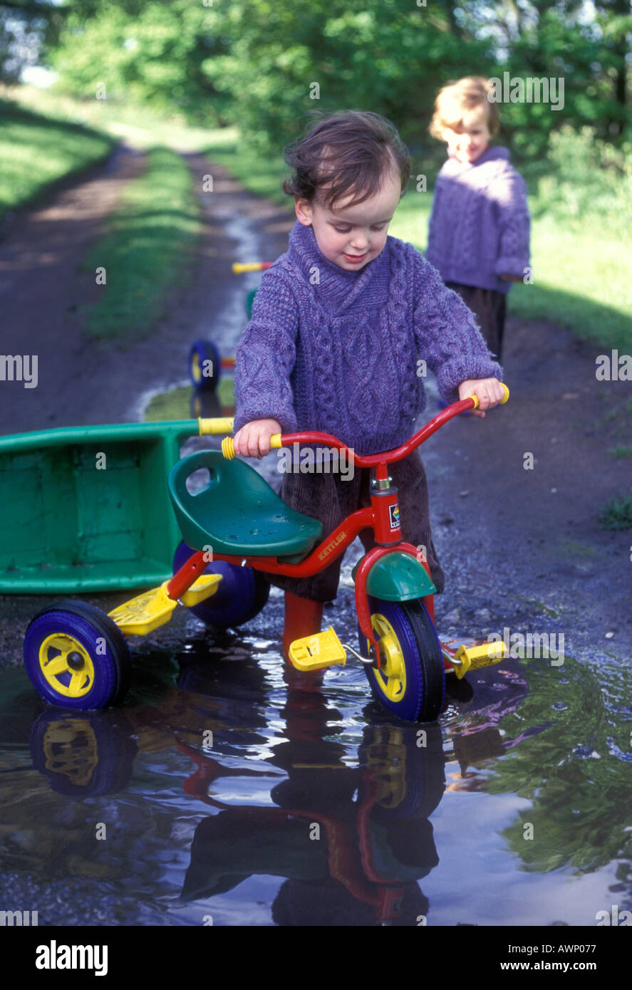 Boy puddle vertical hi-res stock photography and images - Alamy