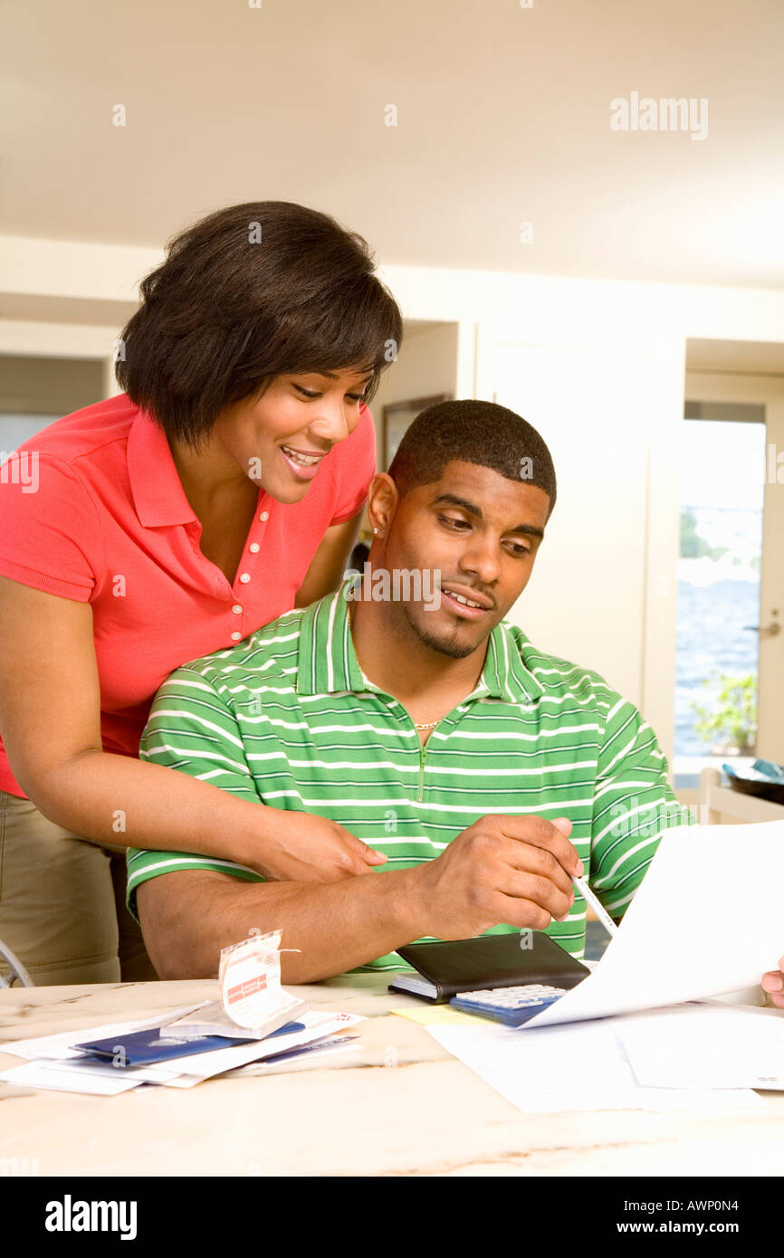 African man reading bill hi-res stock photography and images - Alamy