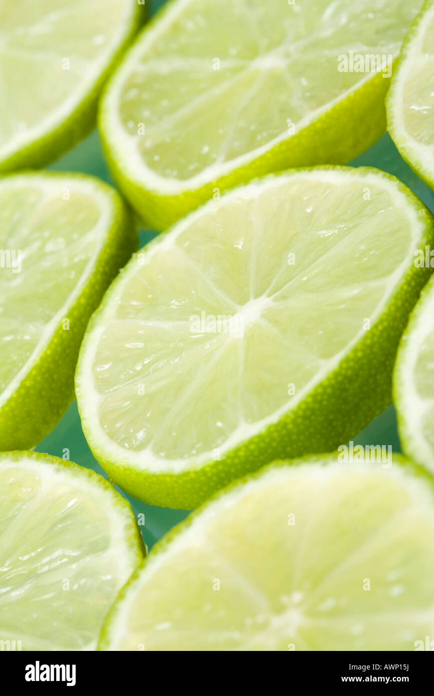 Slices of lime fruit Stock Photo - Alamy