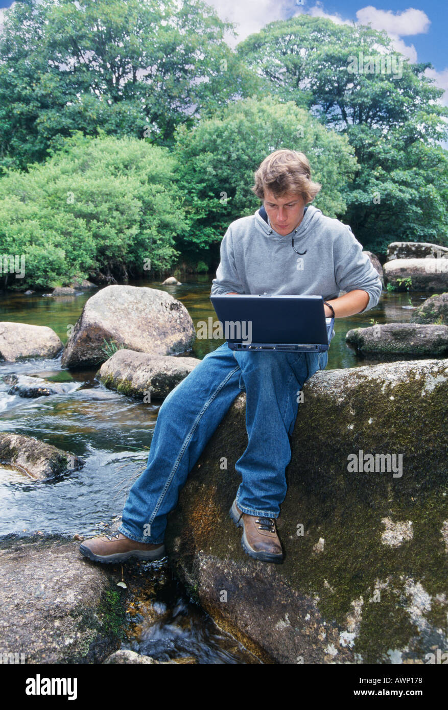 Working at computer outdoors uk hi-res stock photography and images - Alamy