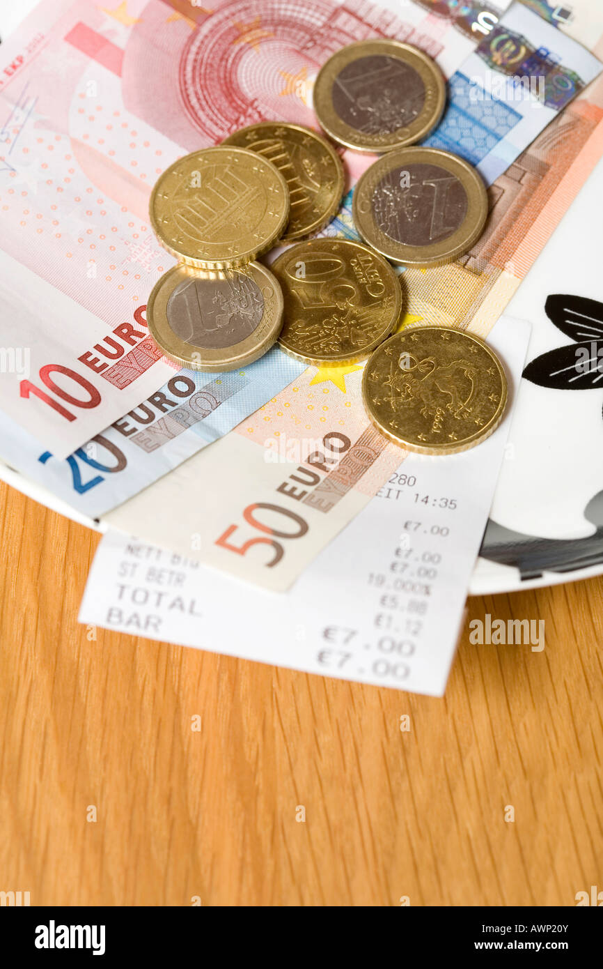 Money On A Plate High Resolution Stock Photography and Images - Alamy