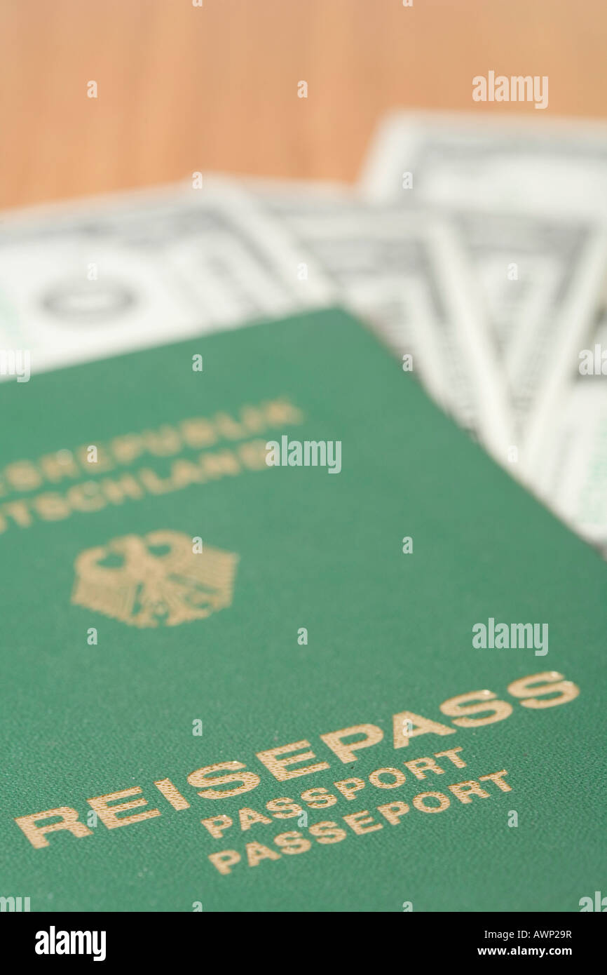 Passport and cash Stock Photo - Alamy