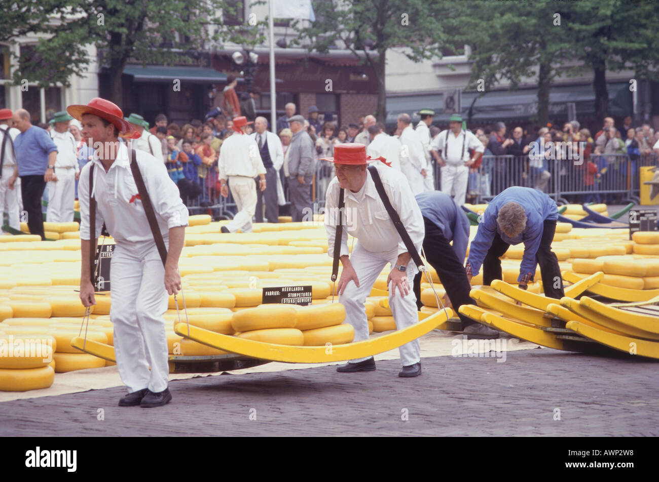Men carrying cheese hi-res stock photography and images - Alamy