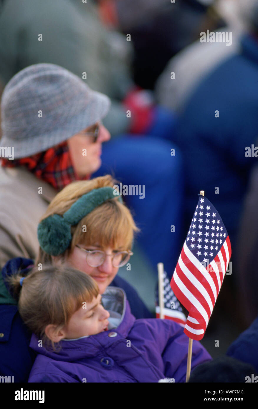 Family watching the inauguration parade for the second Clinton ...