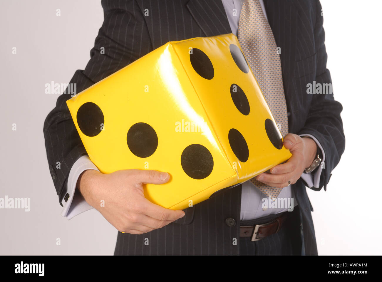 Businessman throwing dice hi-res stock photography and images - Alamy