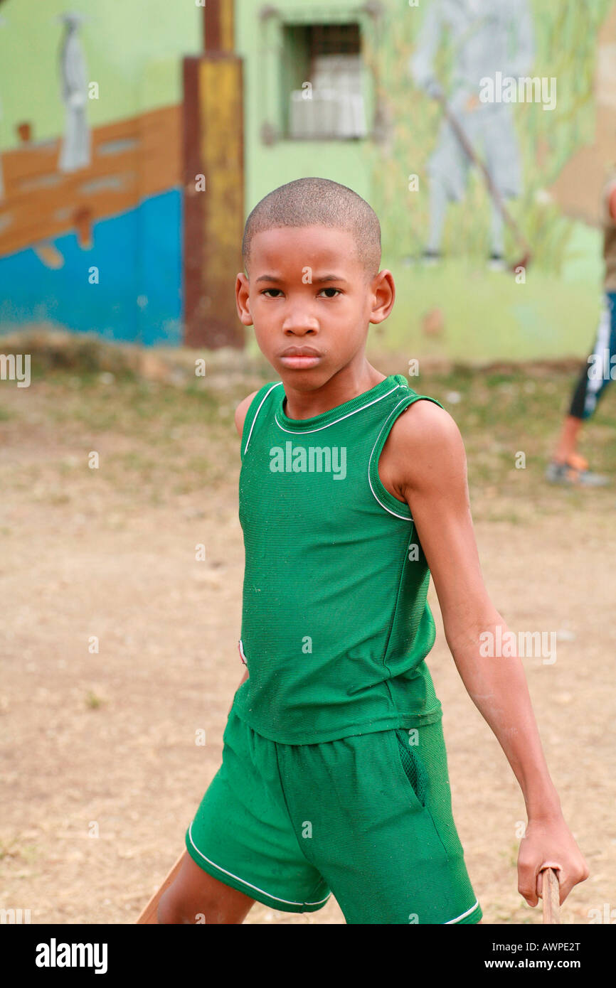 Boy posing for a photograph at a courtyard in Havana, Cuba, Caribbean ...