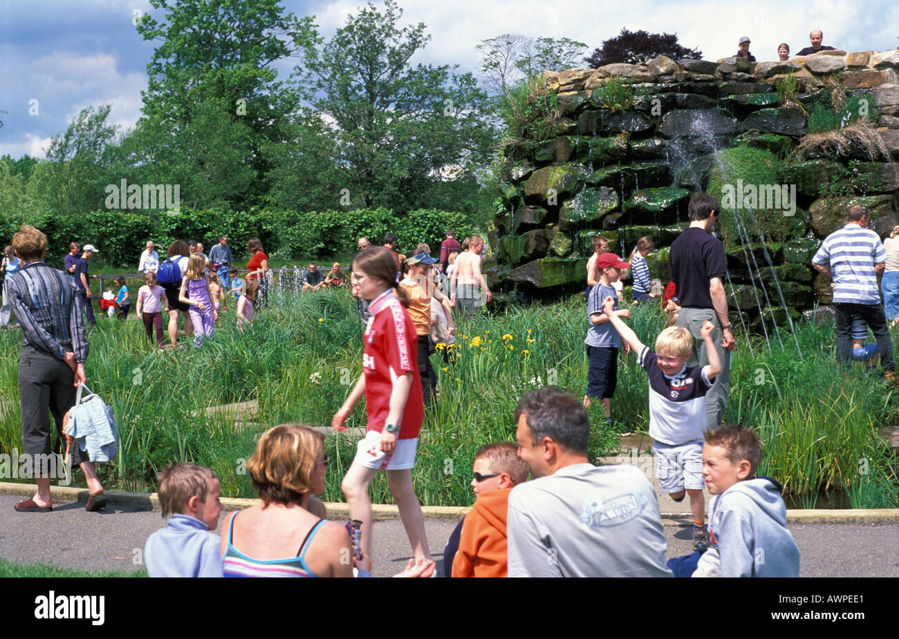 "Water maze" at Hever Castle with lots of people and children Kent ...