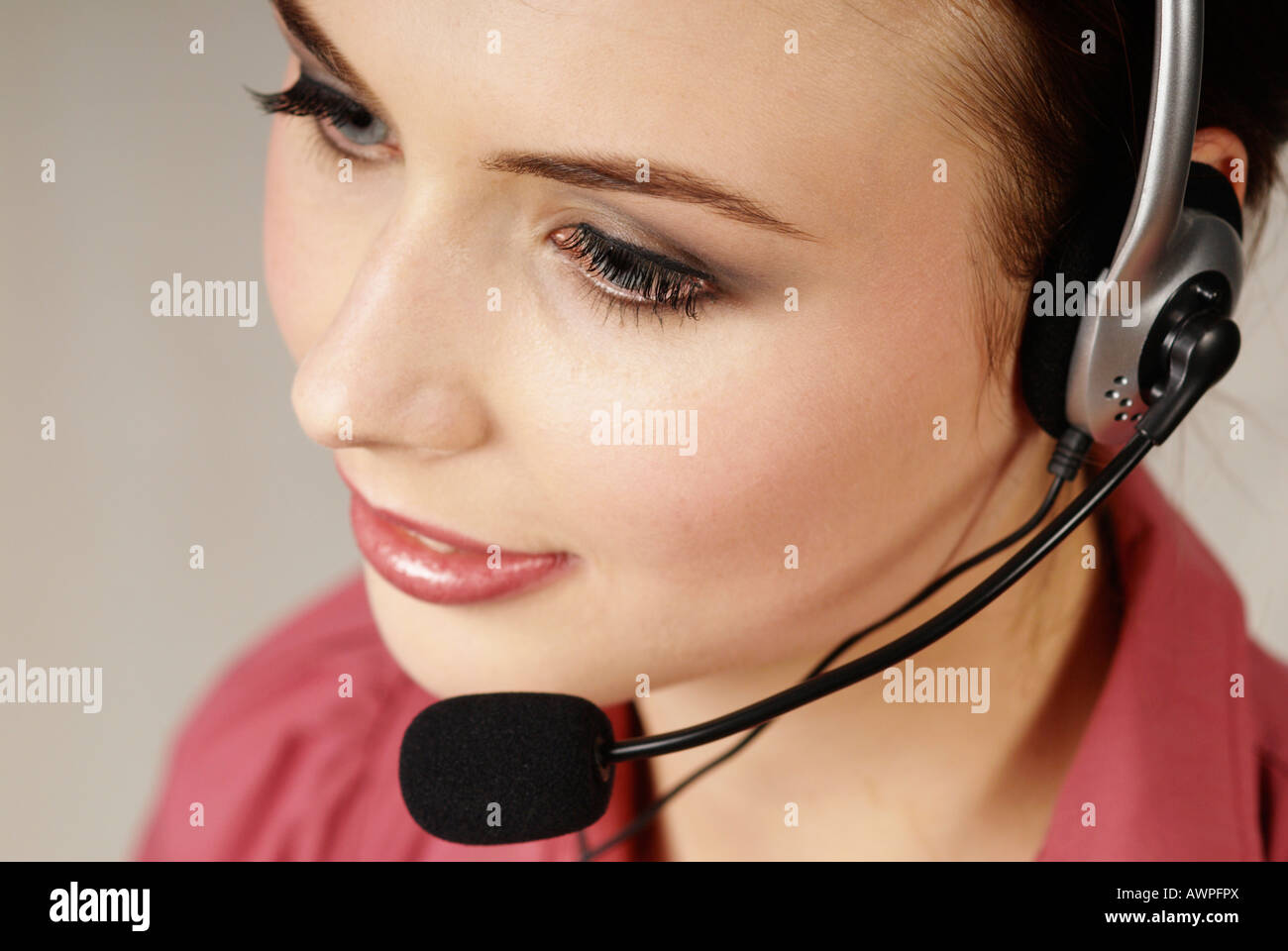 Young woman with headset Stock Photo - Alamy