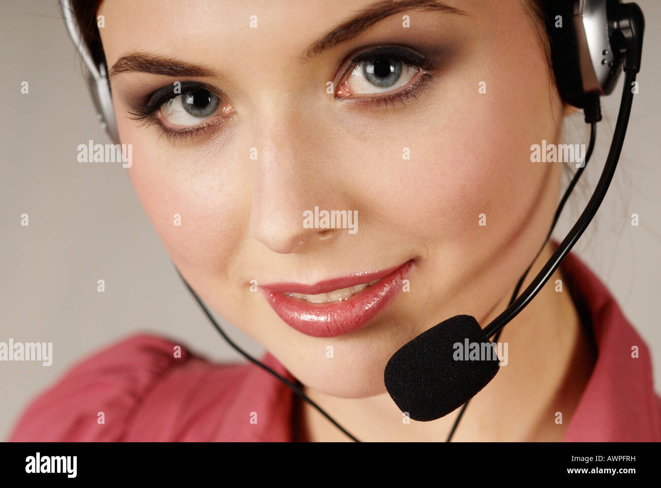 Young woman with headset Stock Photo - Alamy