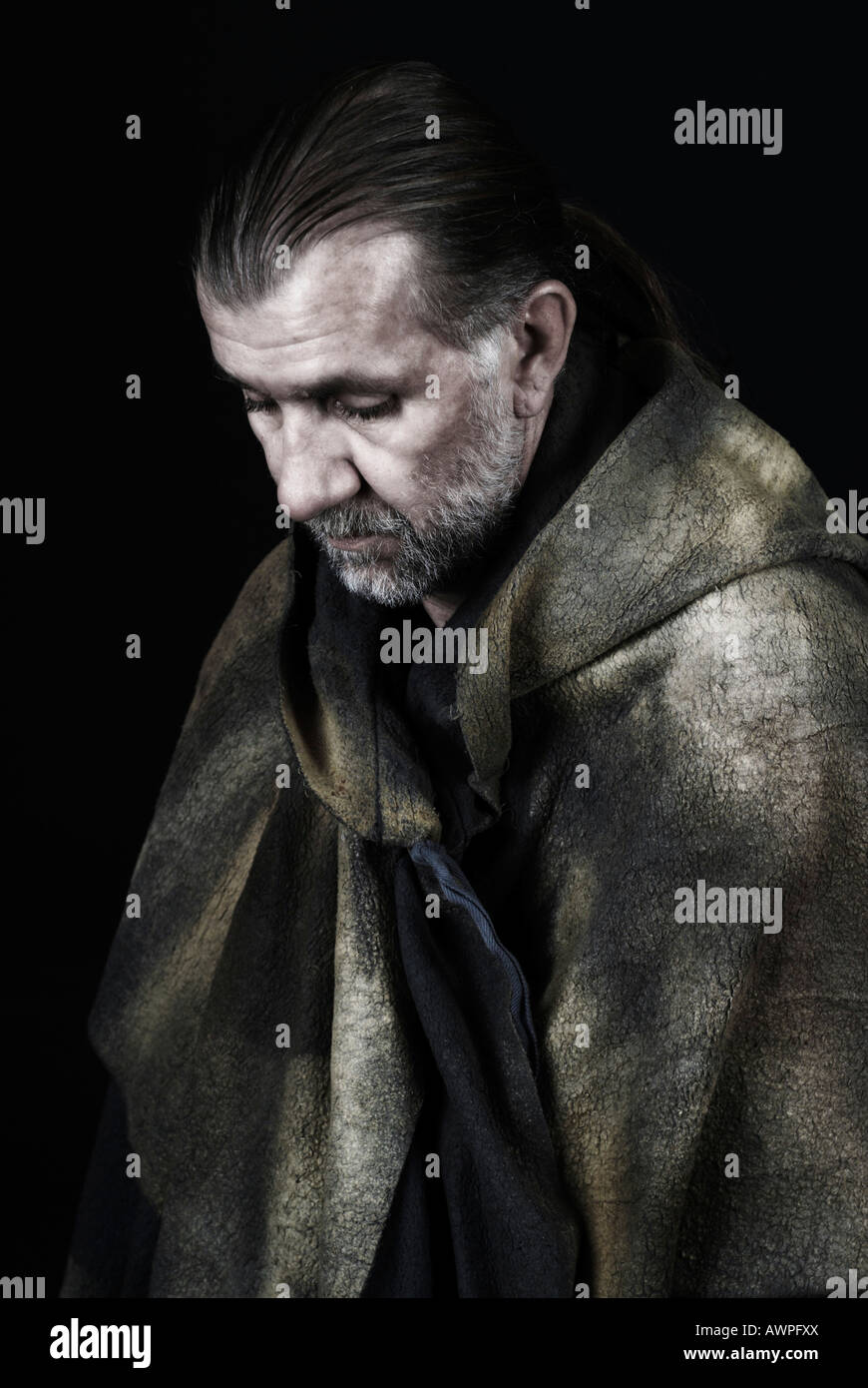 Monk wearing cloak Stock Photo - Alamy