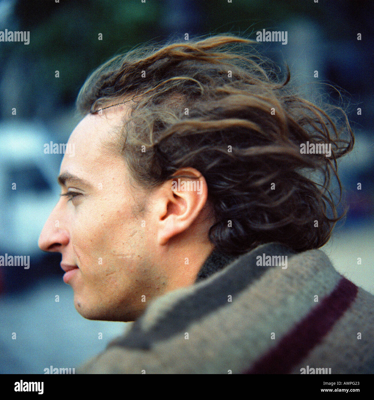 Man smiling, side view Stock Photo - Alamy