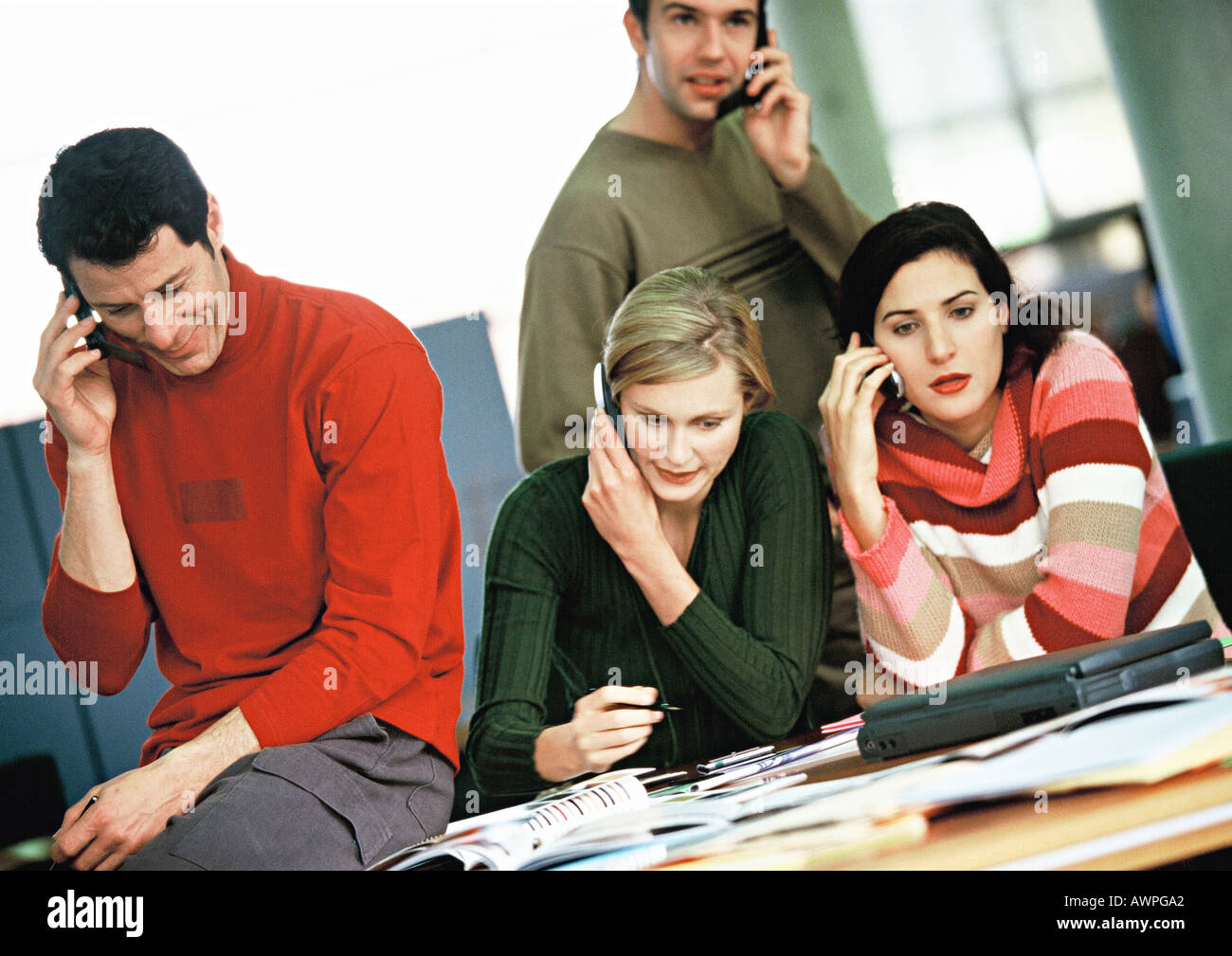 Business people using cell phones Stock Photo - Alamy