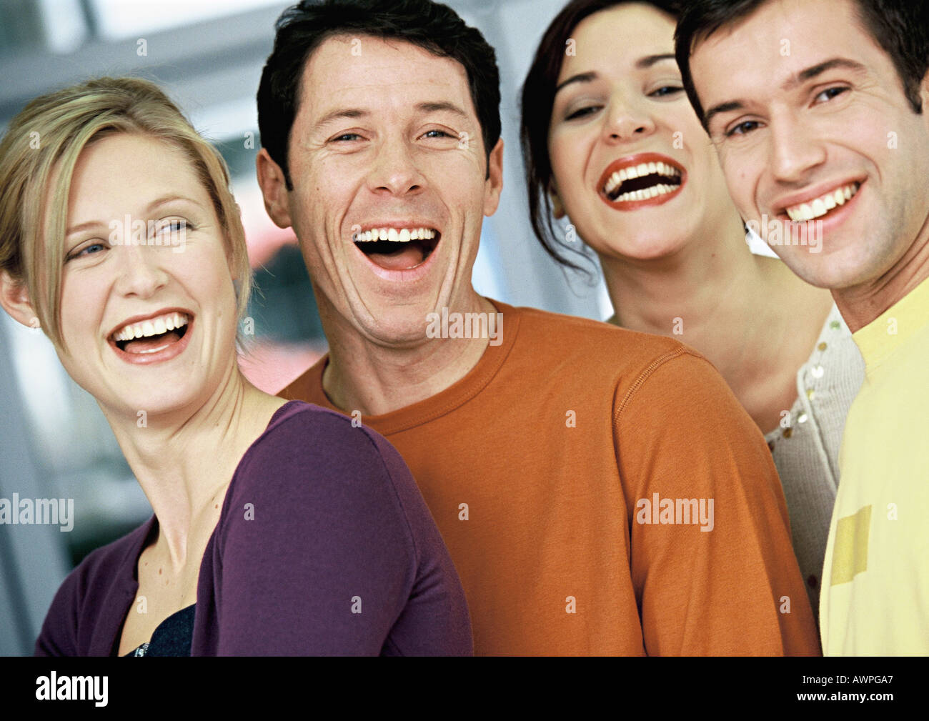 Four people smiling, portrait Stock Photo - Alamy
