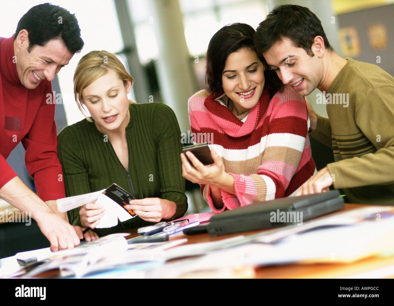 Business people working at table Stock Photo - Alamy