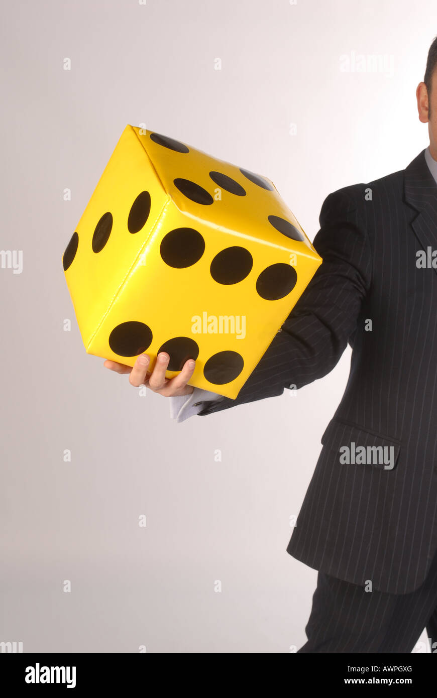 Businessman throwing dice hi-res stock photography and images - Alamy