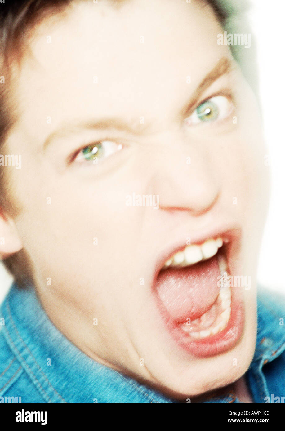 Teenage boy shouting, close-up, portrait Stock Photo - Alamy