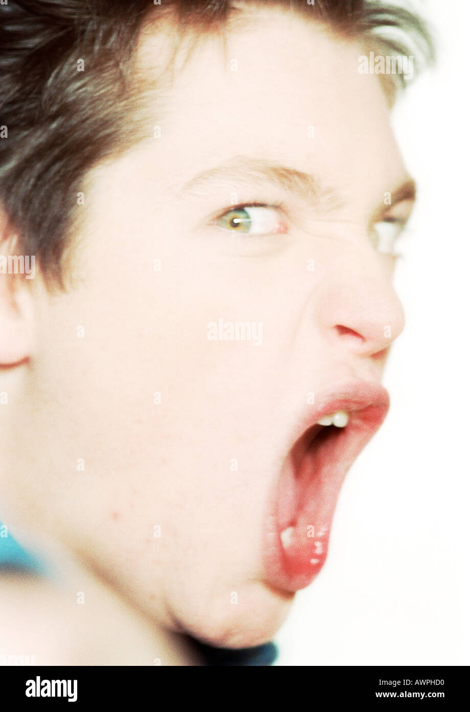 Teenage boy shouting, close-up, portrait Stock Photo - Alamy