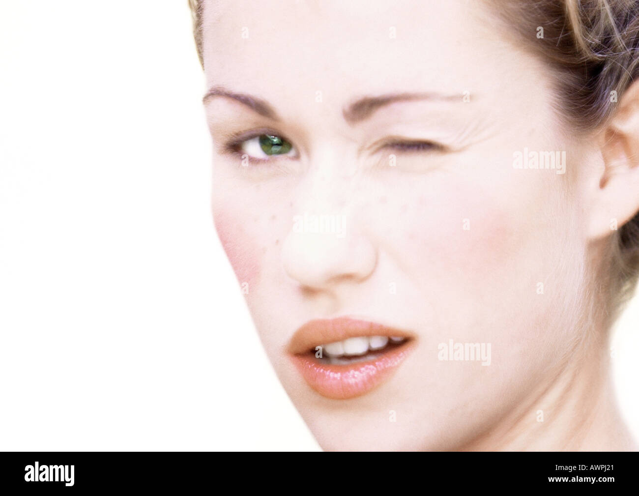 Woman winking sly hi-res stock photography and images - Alamy