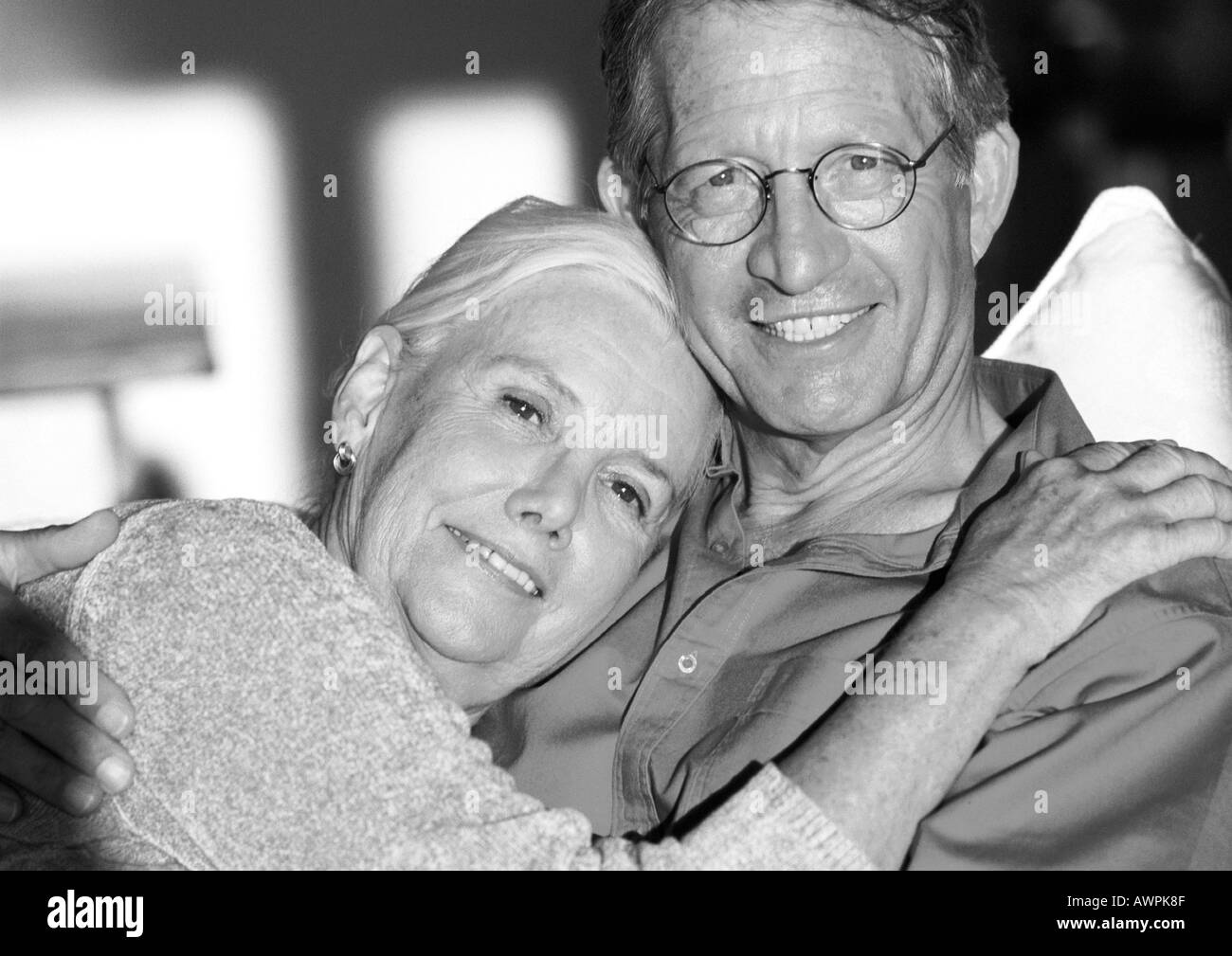 Mature couple hugging, portrait Stock Photo - Alamy