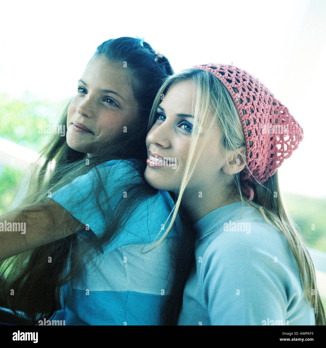 Young woman and girl, side view Stock Photo - Alamy