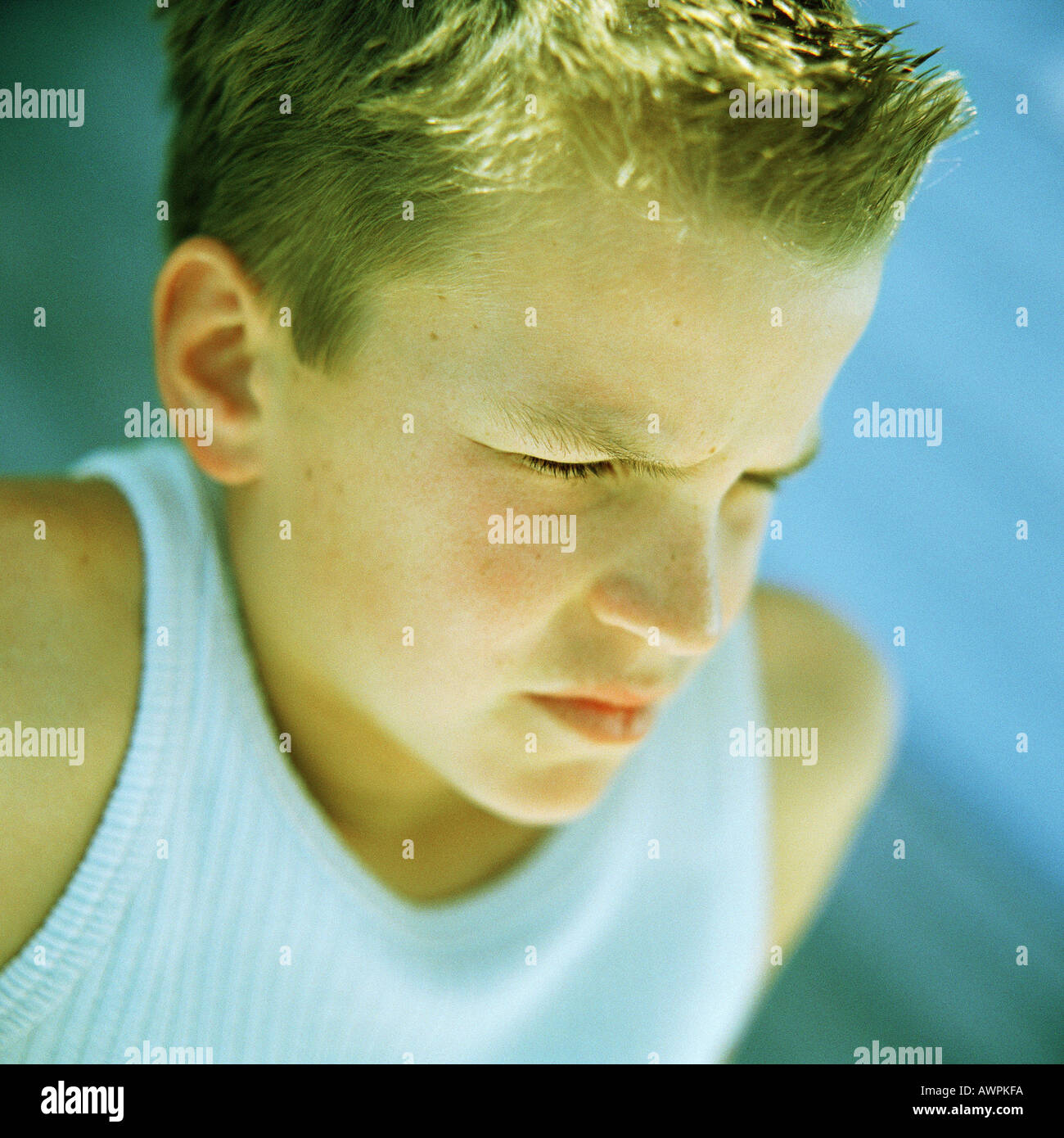 Teenage boy's face, frowning Stock Photo - Alamy