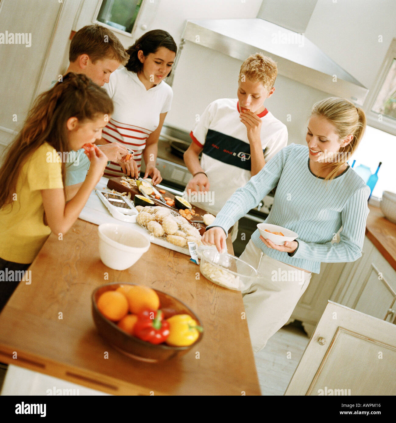 Teenager boy eating cookies hi-res stock photography and images - Alamy