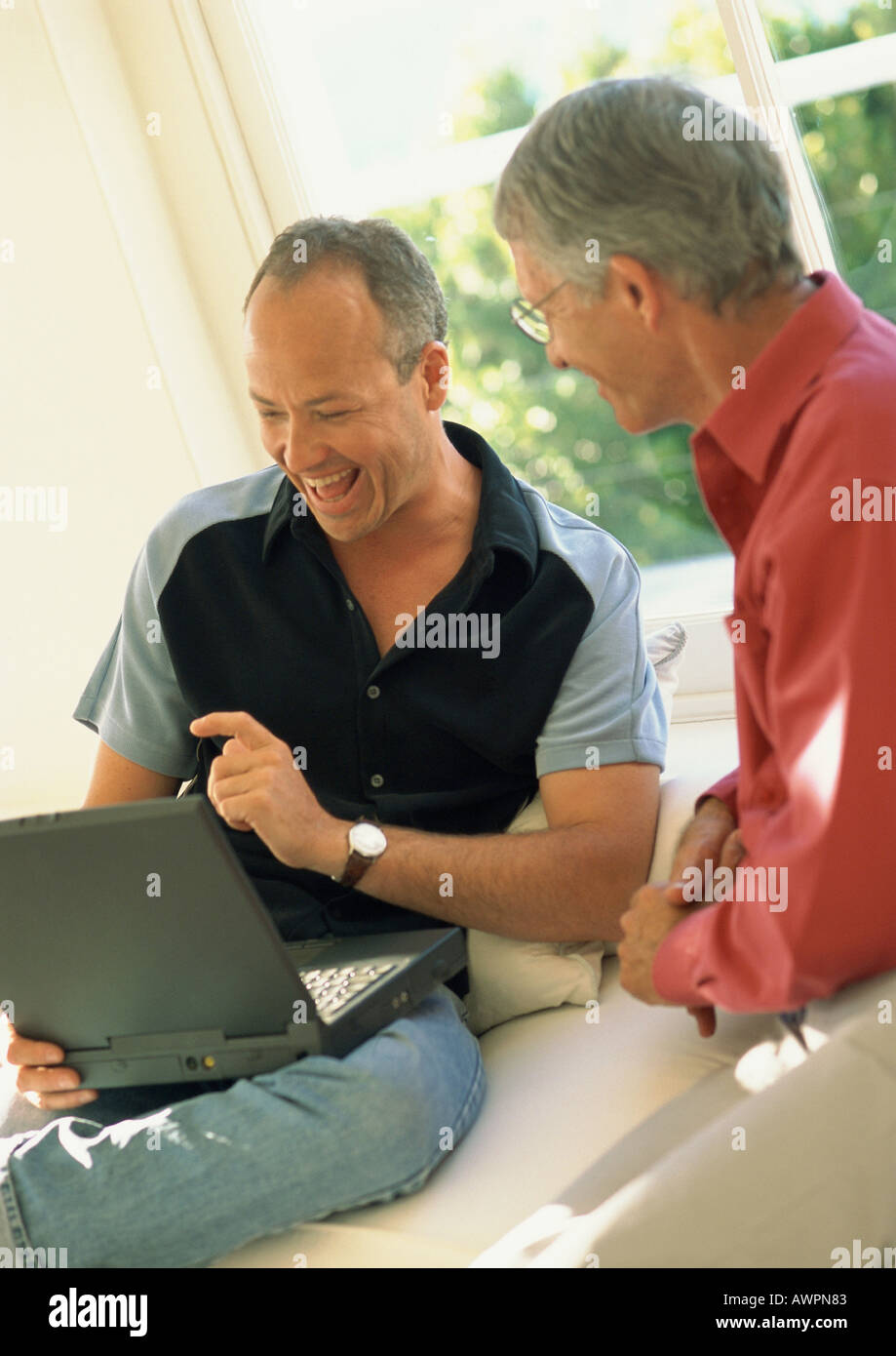 Father son using computers hi-res stock photography and images - Alamy