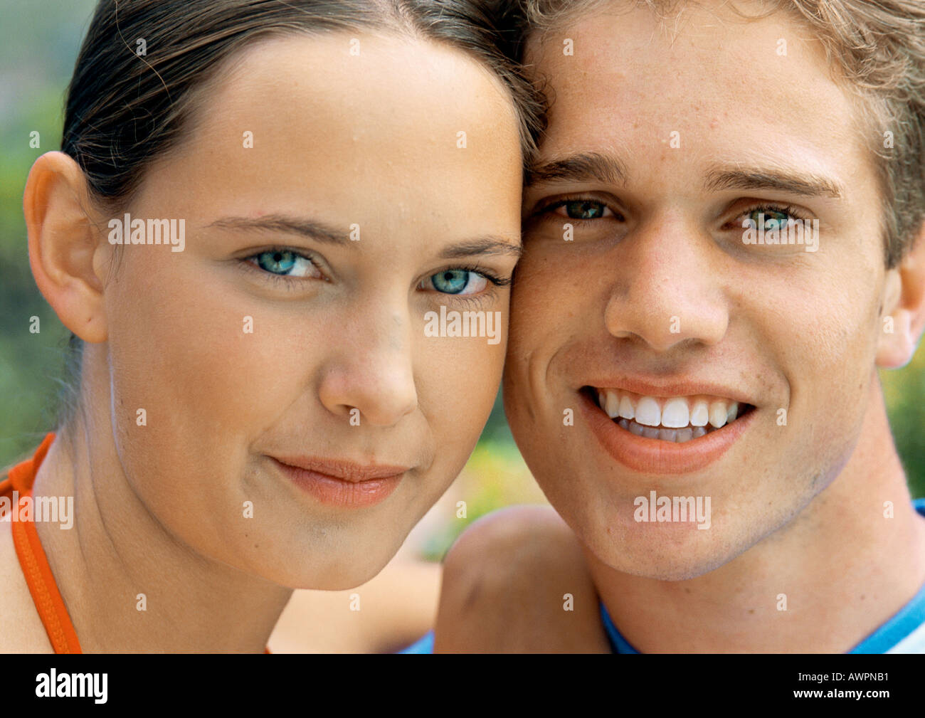 Two teenagers cheek to cheek, close-up, portrait Stock Photo - Alamy