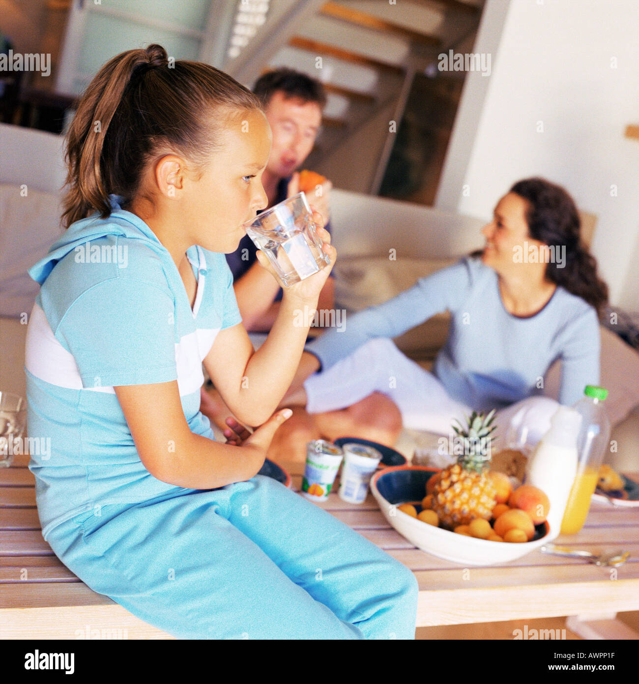 Parents daughter on orange background hi-res stock photography and ...