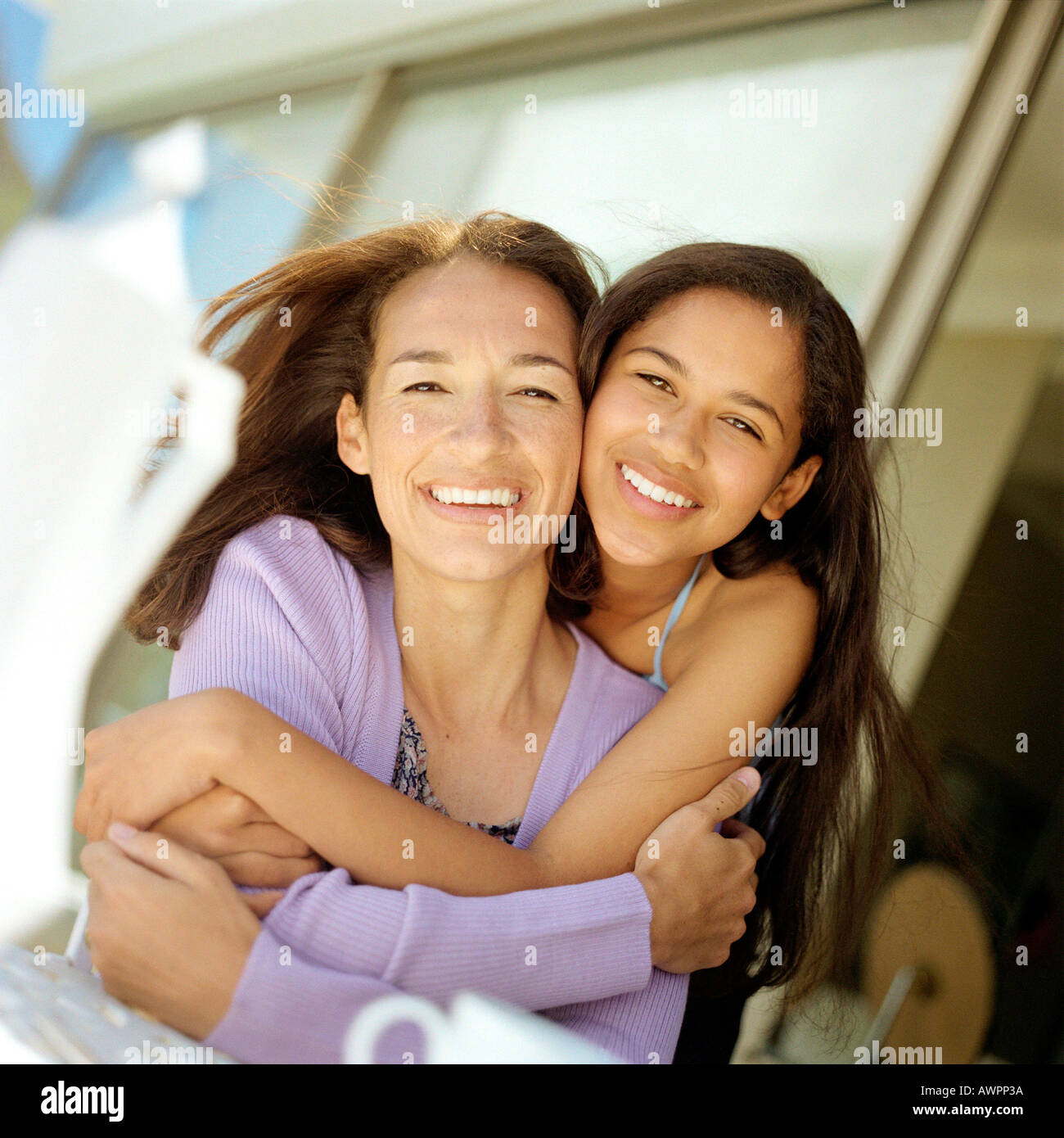 Mother and daughter hugging, portrait Stock Photo - Alamy
