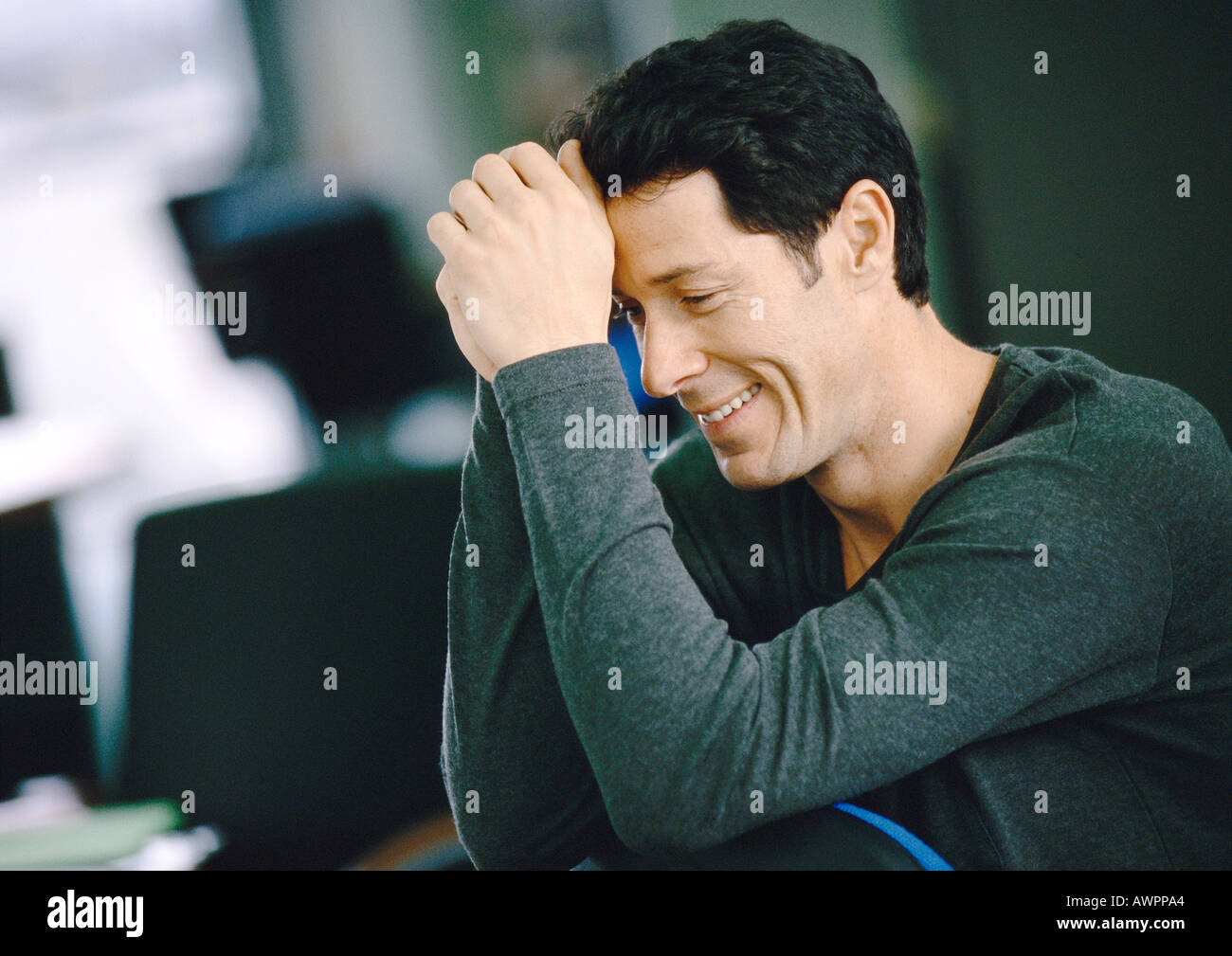 Man smiling, side view Stock Photo - Alamy