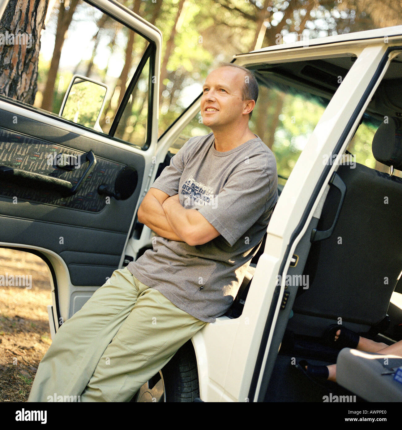 Man leaning against van open hi-res stock photography and images - Alamy