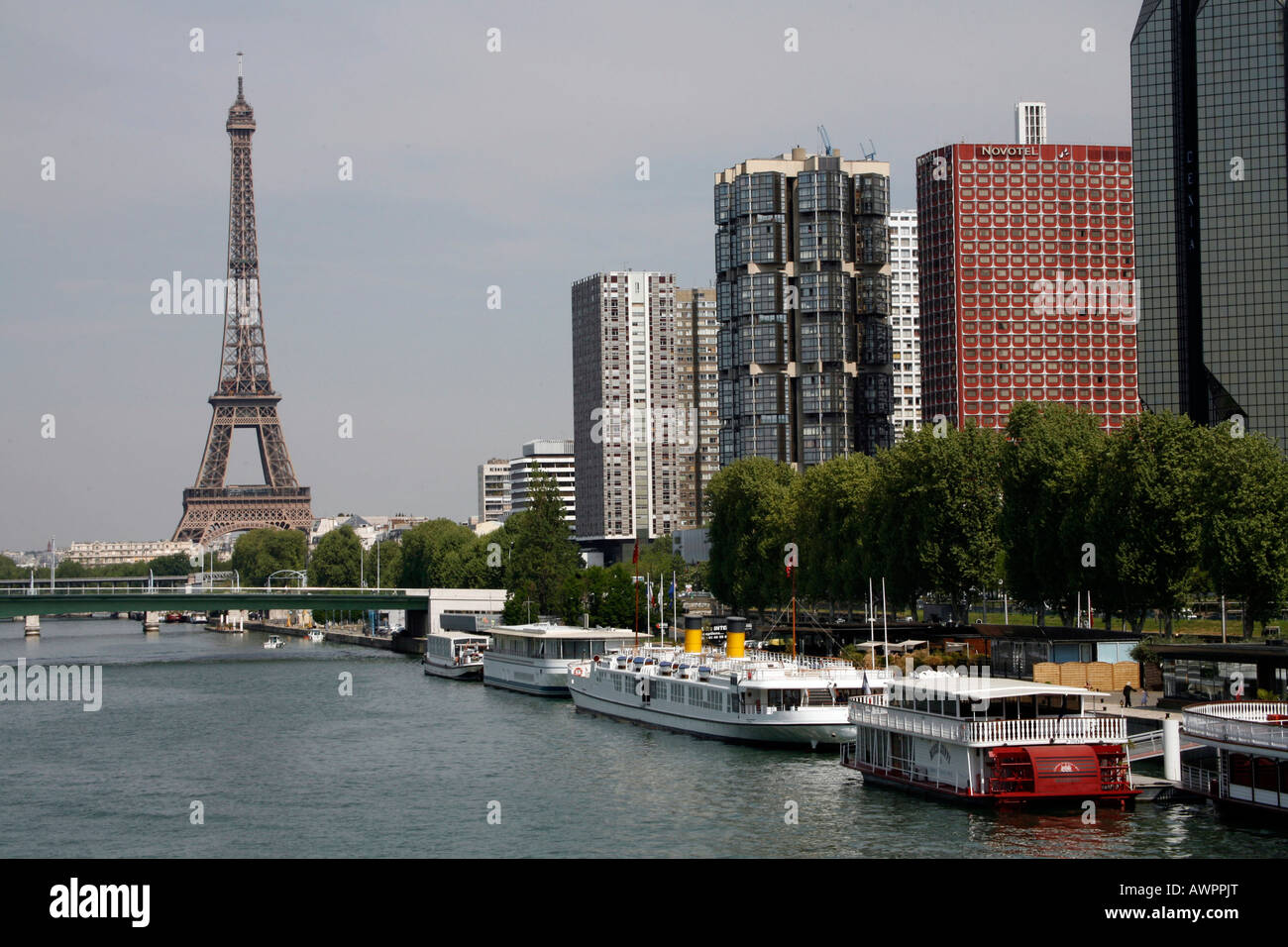 View of the Eiffel Tower, the Seine and office towers at Quai André ...