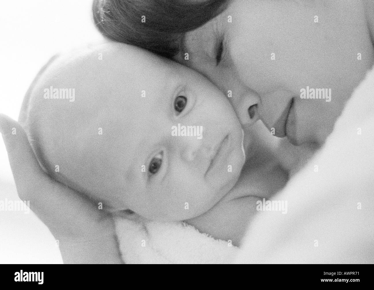 Close up mother hold Black and White Stock Photos & Images - Alamy