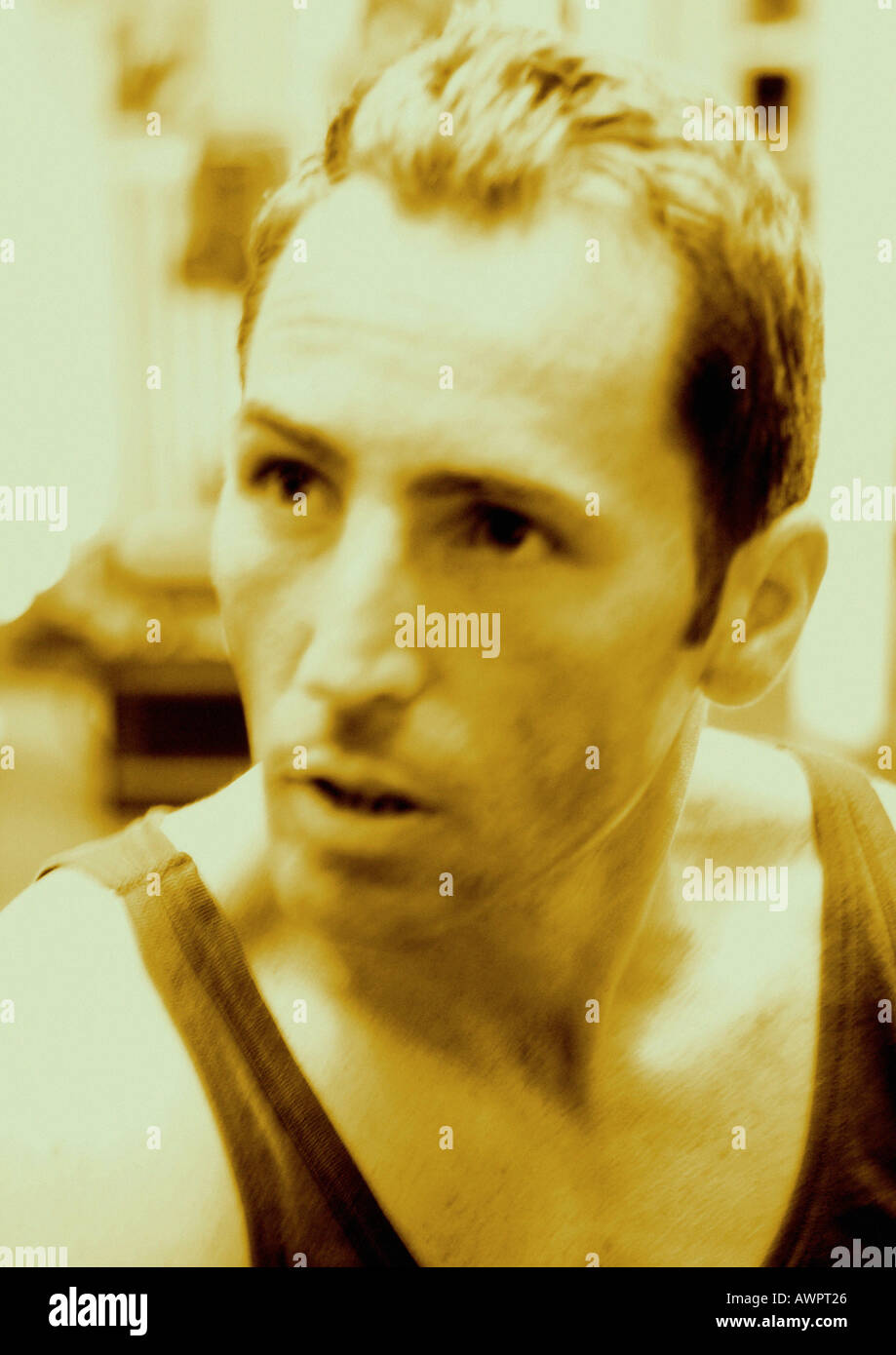 Serious man wearing tank hi-res stock photography and images - Alamy