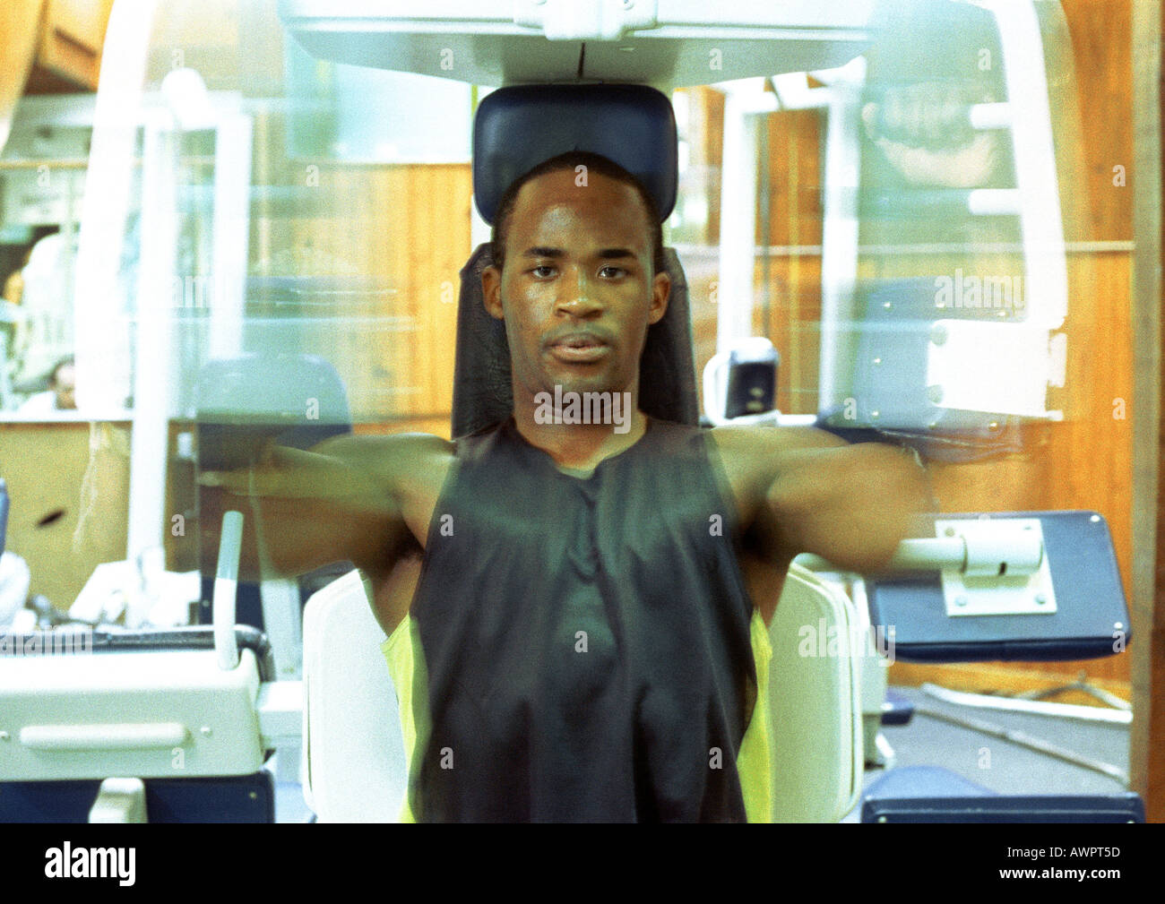 Man using weight machines in hi-res stock photography and images - Alamy
